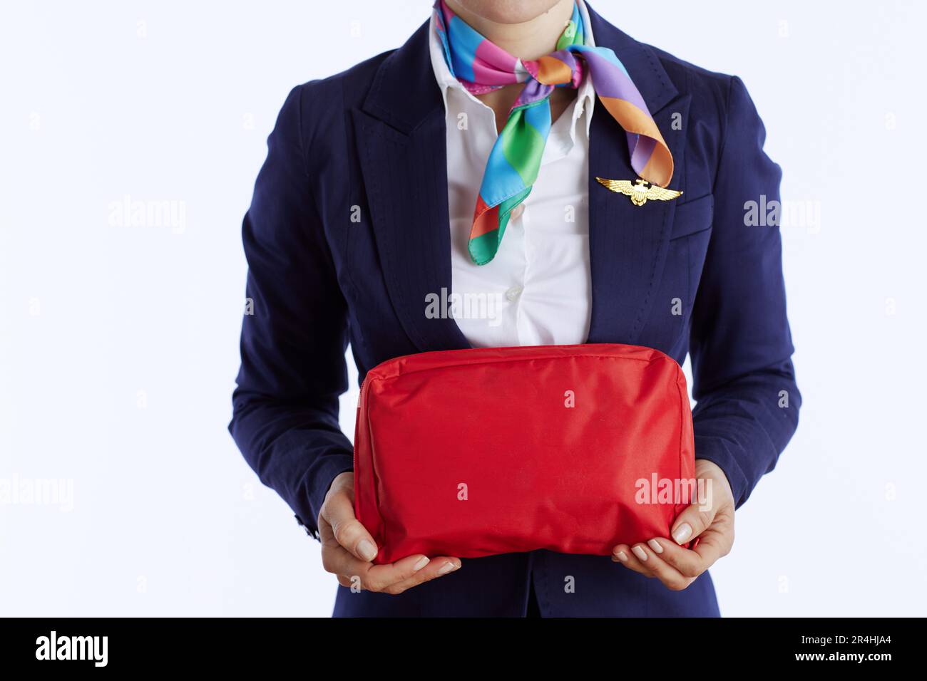 Closeup on elegant flight attendant woman isolated on white background ...