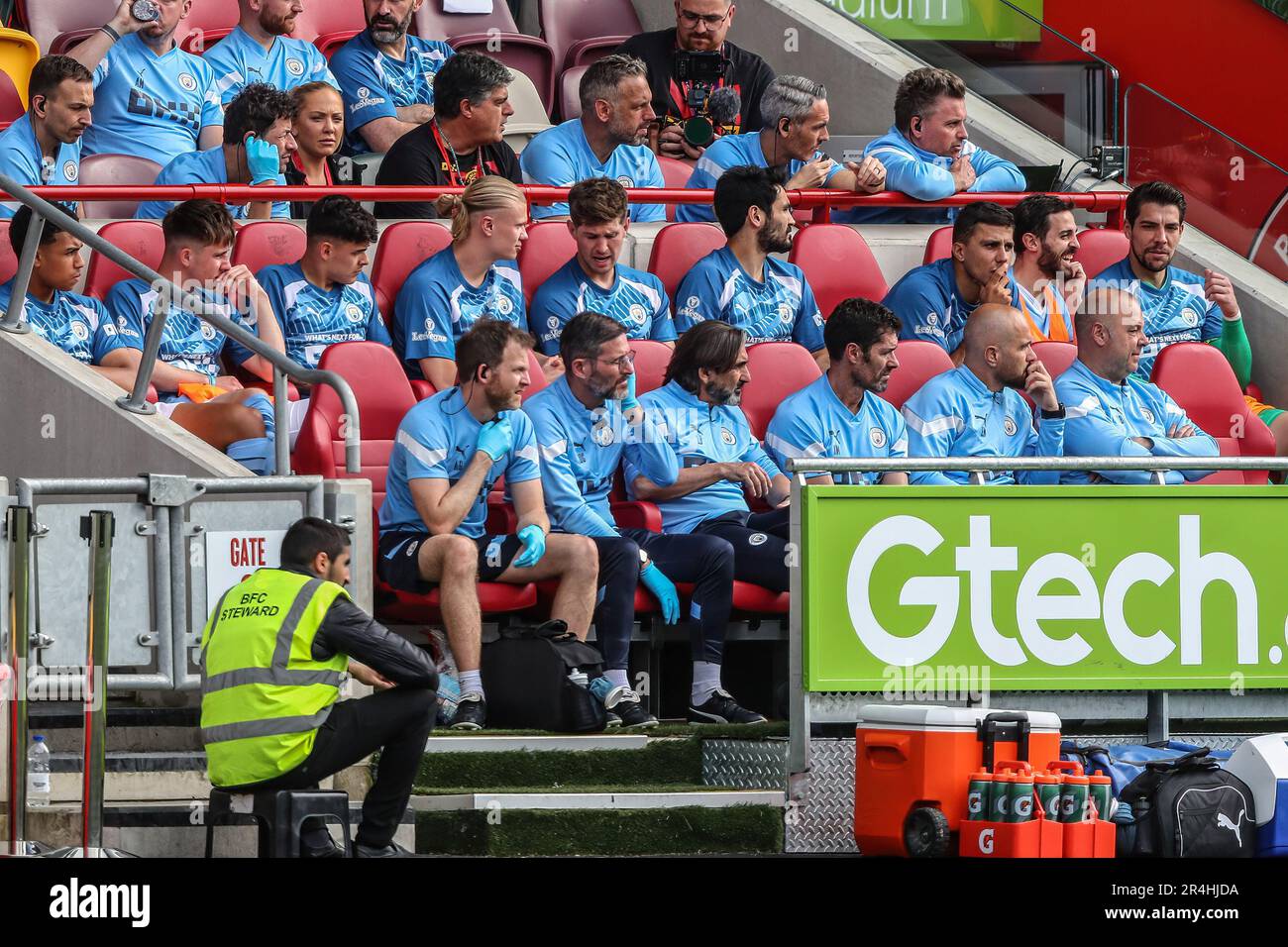 Manchester City bench with Erling Håland #9 of Manchester City, John ...