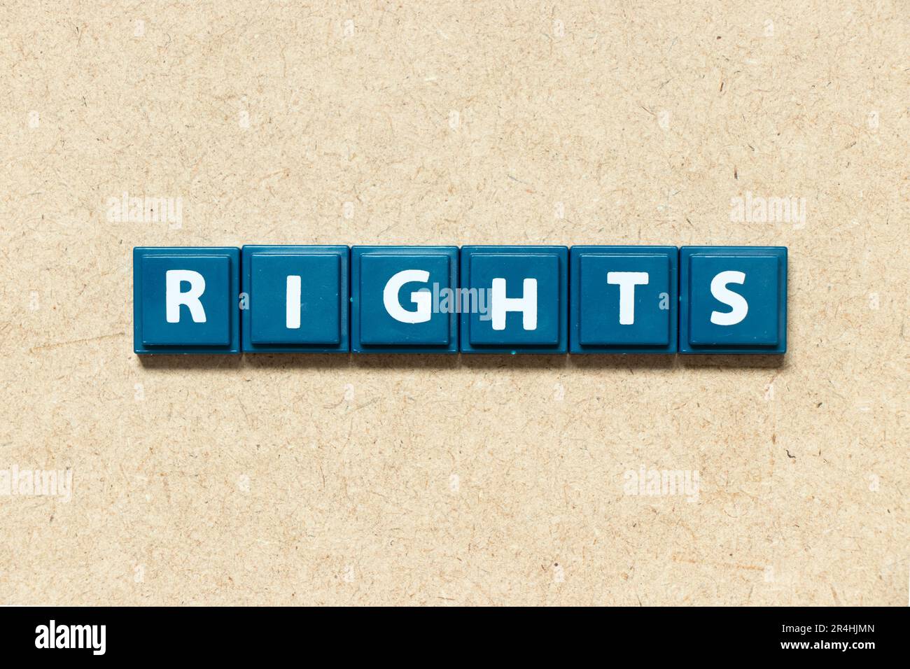 Tile alphabet letter in word rights on wood background Stock Photo - Alamy