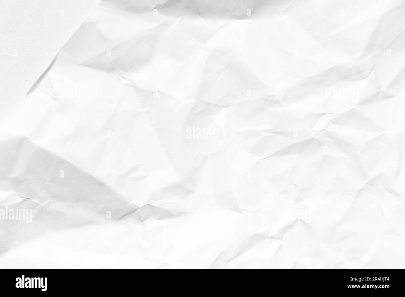 Grunge wrinkled white color paper textured background with copy space ...