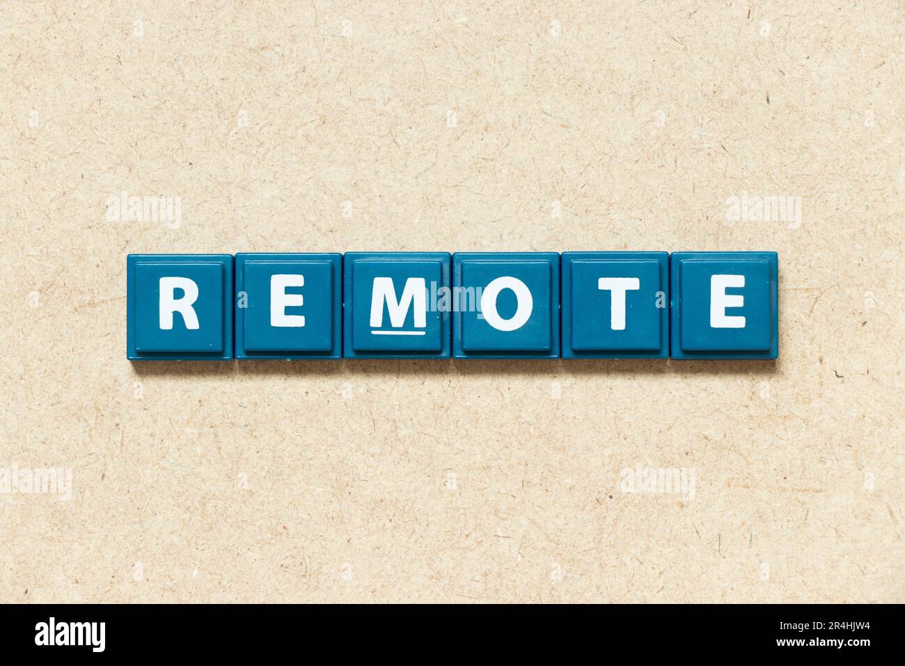 Tile alphabet letter in word remote on wood background Stock Photo - Alamy