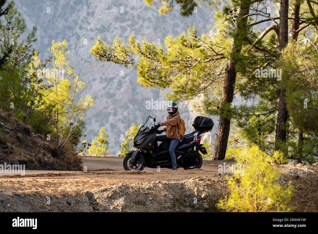 Turkey, Scooter white Yamaha The scooter is parked in the mountains of ...
