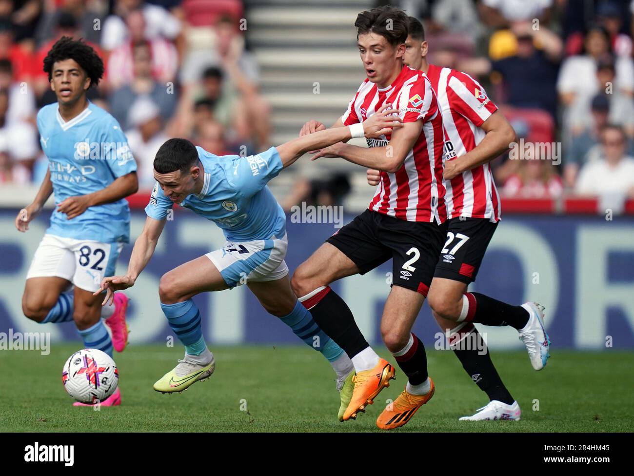 Manchester City's Phil Foden gets away from Brentford's Aaron Hickey ...