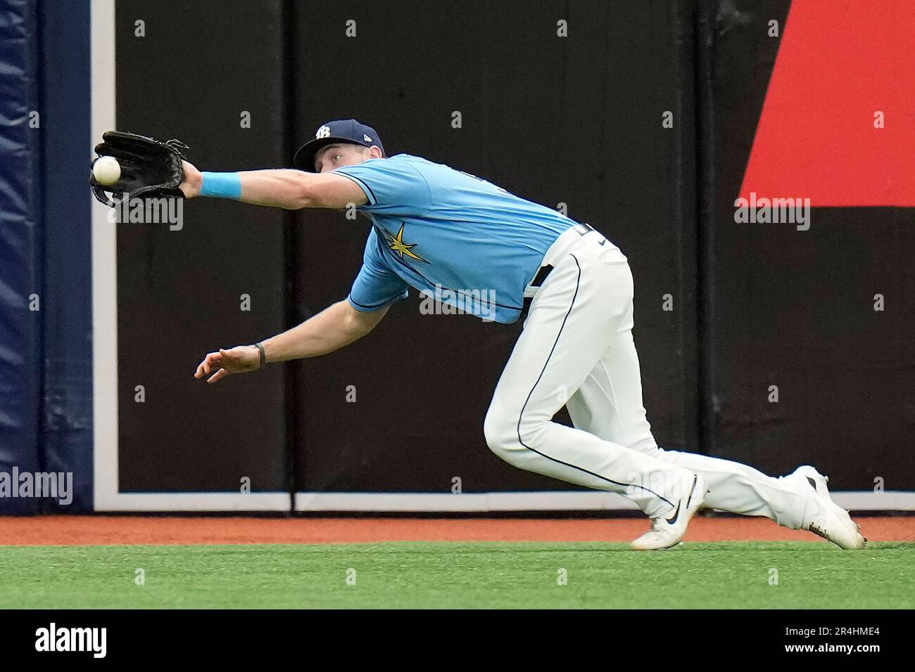 Tampa Bay Rays left fielder Luke Raley makes a diving catch on a fly ...
