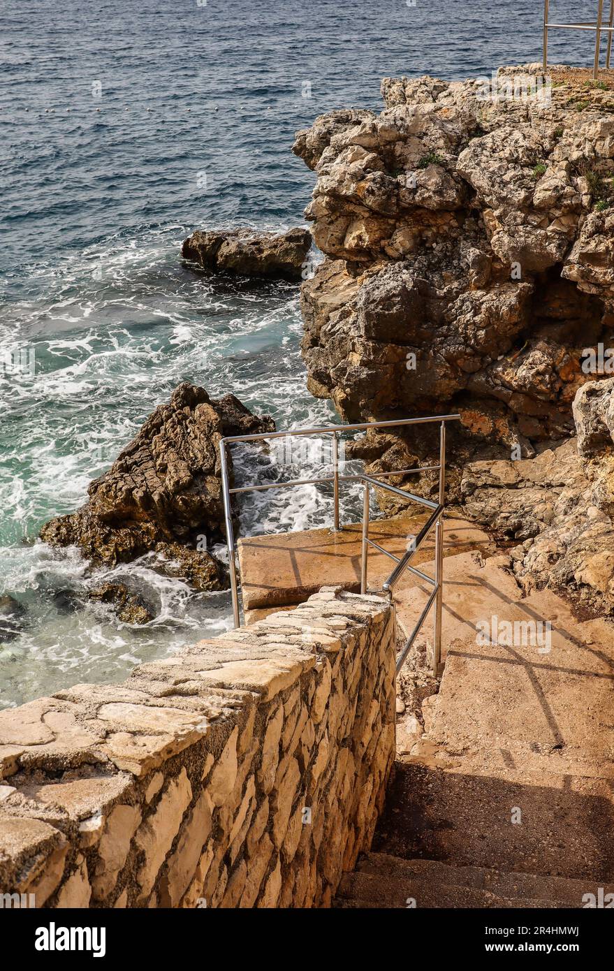 Vertical View of Rocky Beach with Stairs in Verudela. Croatian Summer ...