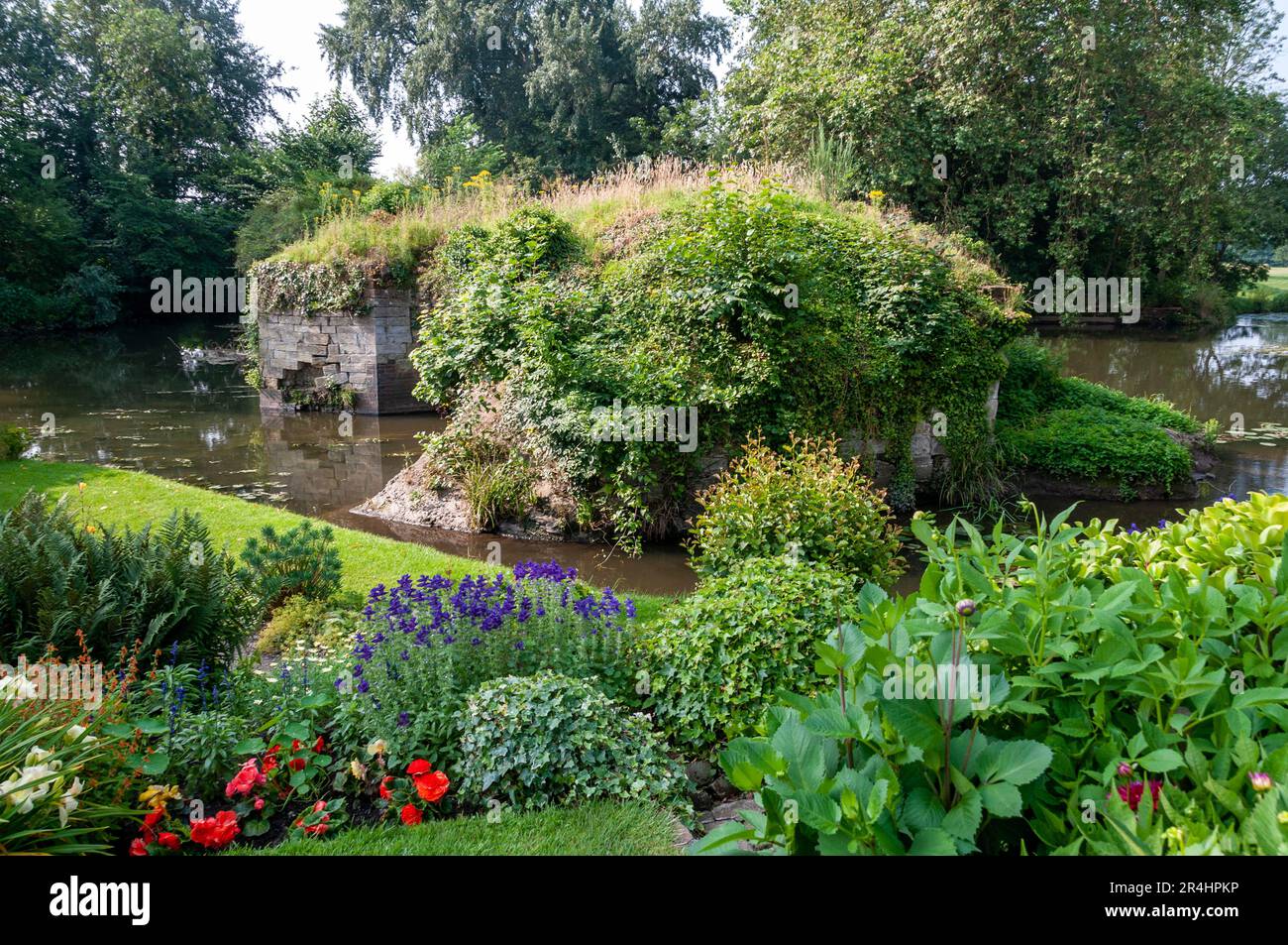 The ruins of the medieval bridge built in 1374, across the River Avon ...