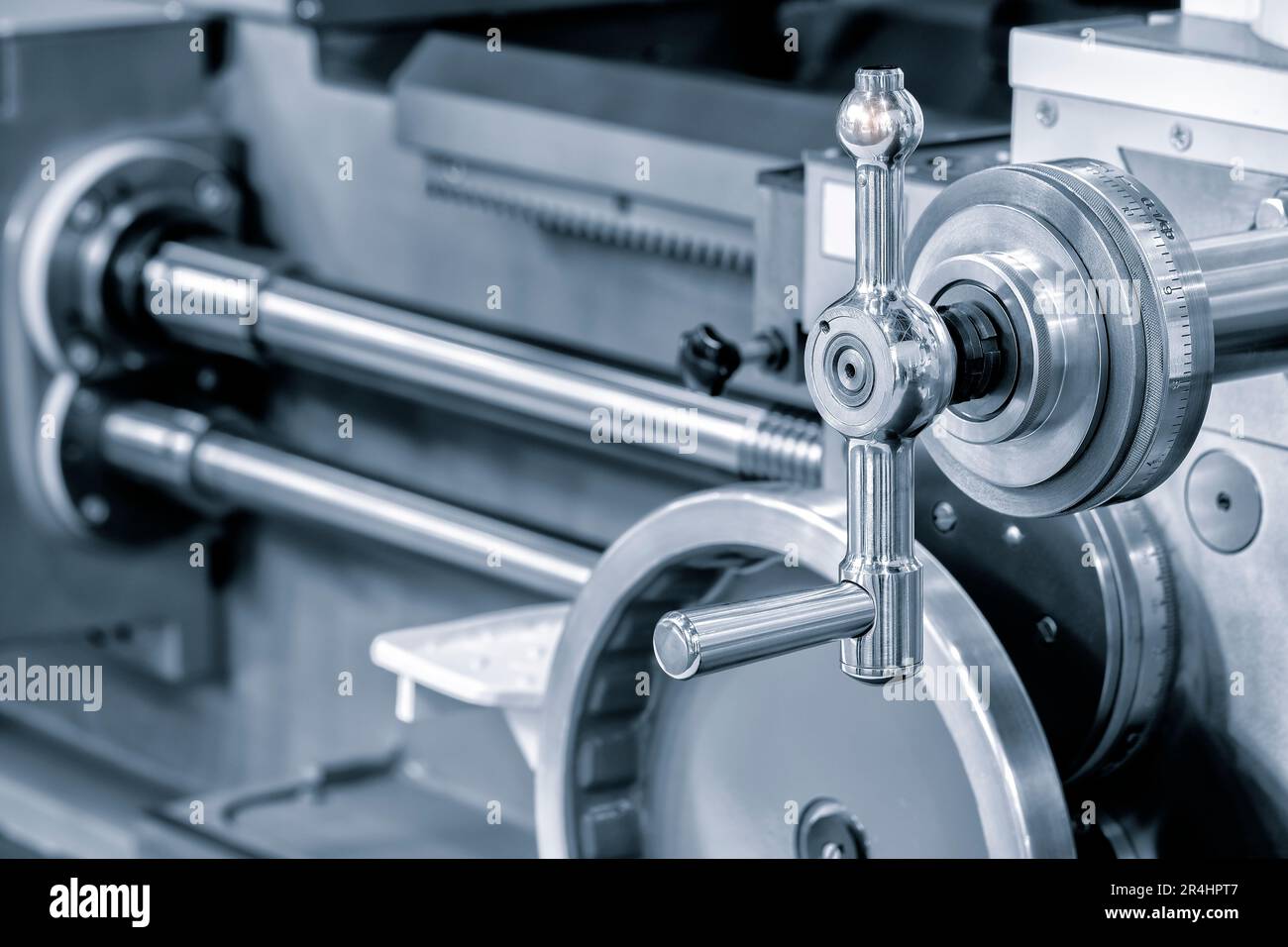 Lathe control knobs close up blue tone. Metal machine tools industry ...