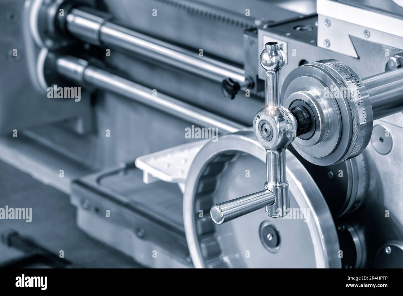 Lathe control knobs close up blue tone. Metal machine tools industry ...