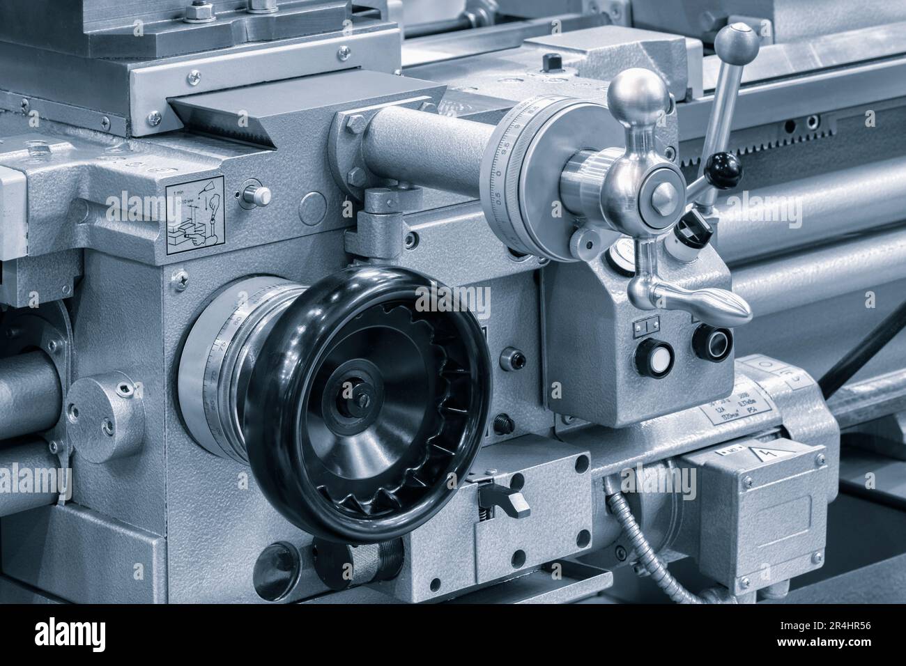 Lathe control knobs close up blue tone. Metal machine tools industry ...