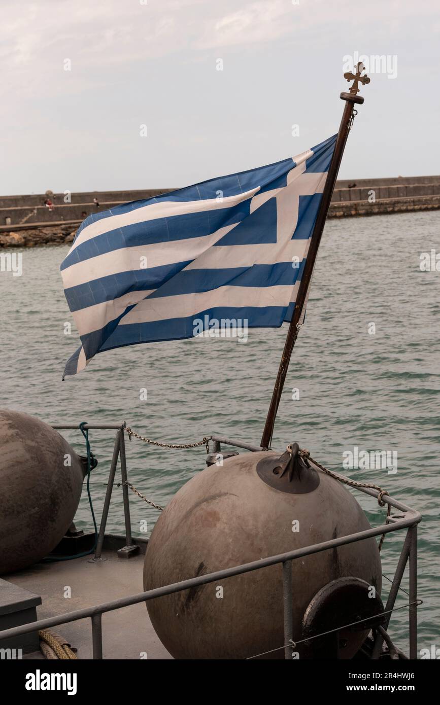 Heraklion, Crete, Greece. 2023. The Greek flag flying from the stern of ...