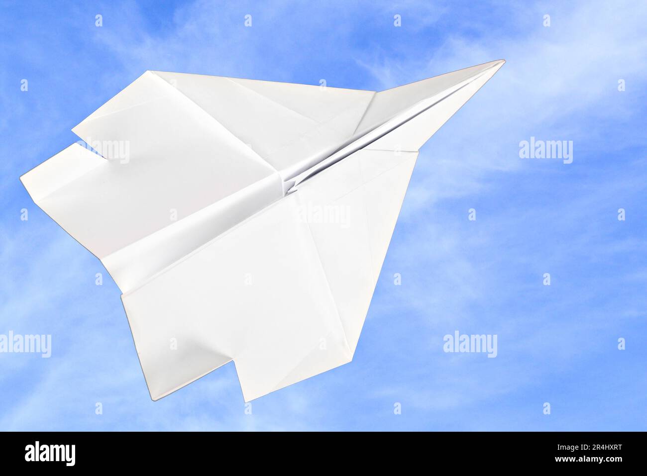 White paper plane isolated on blue background Stock Photo - Alamy