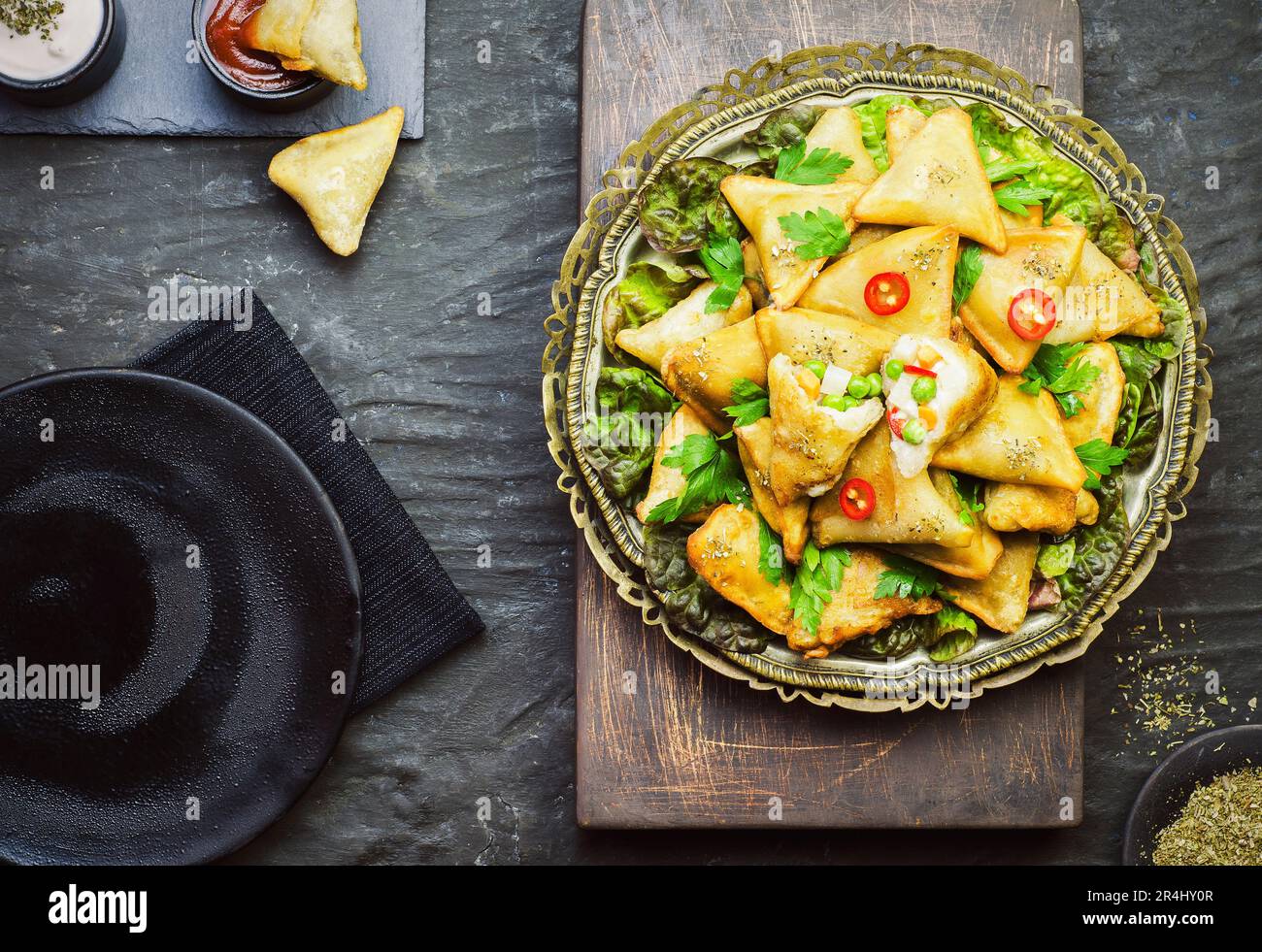 Delicious vegetarian Samosa served with tomato and yogurt sauce. Top ...