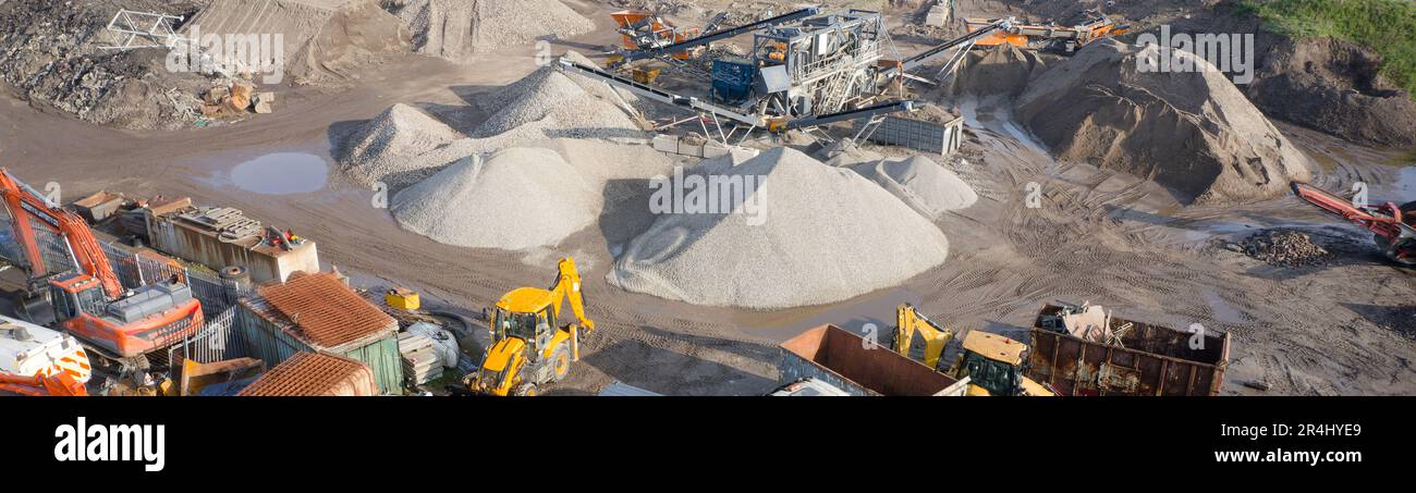 Quarry works industrial digging aerial view from above showing sand ...