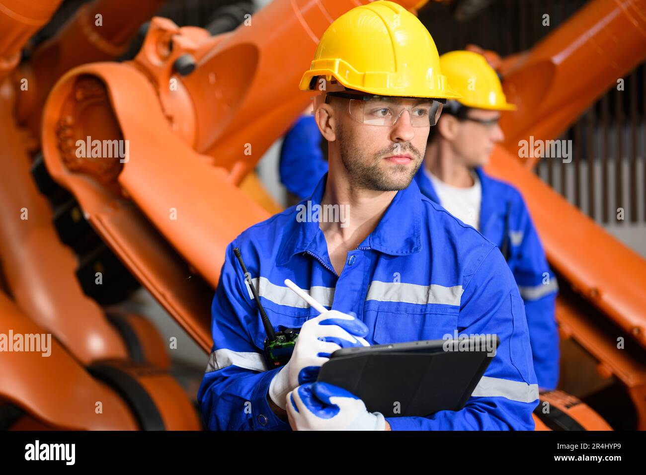 Maintenance engineers team working together at industrial factory Stock ...