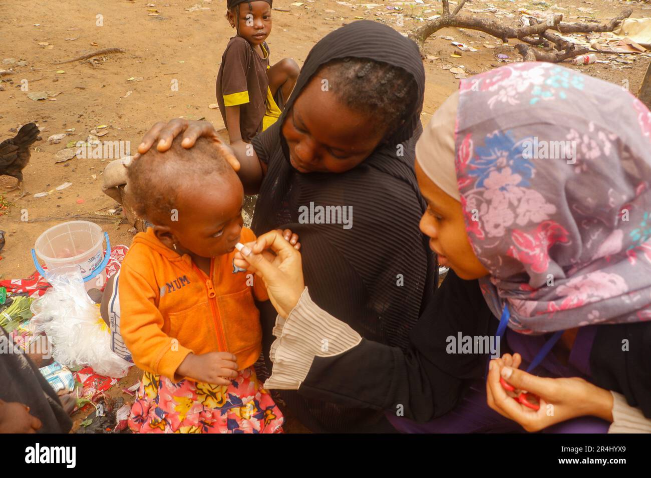 People are seen receiving free medical care at a makeshift shelter at ...