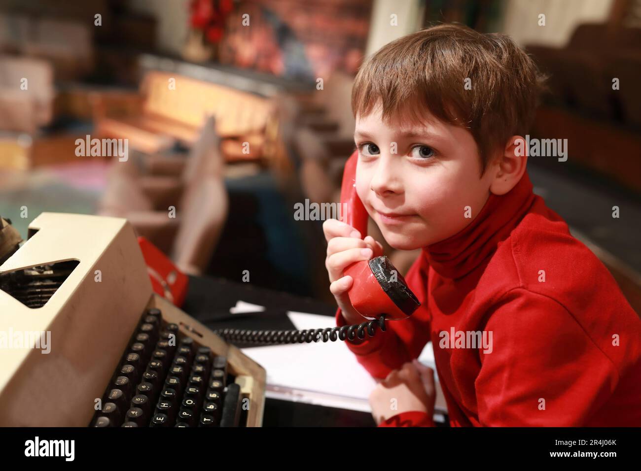 Portrait of child posing with retro phone Stock Photo - Alamy