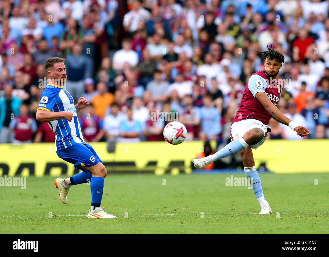 Aston Villa's Tyrone Mings (right) and Brighton and Hove Albion's Alexis Mac Allister battle for ...