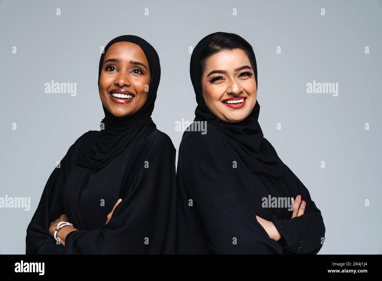 Beautiful arab middle-eastern women with traditional abaya dress in ...