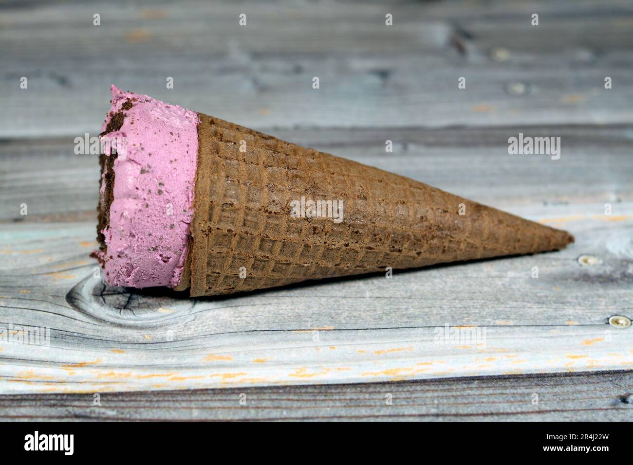Ice-cream of special flavors in crispy wafer cones, melting cold ice ...
