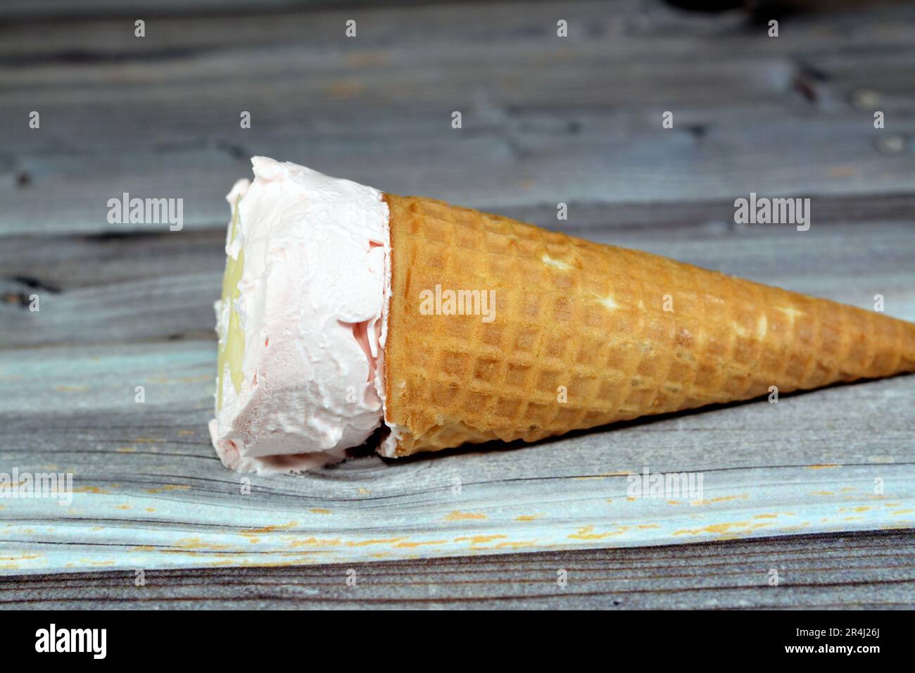 Ice-cream of special flavors in crispy wafer cones, melting cold ice ...