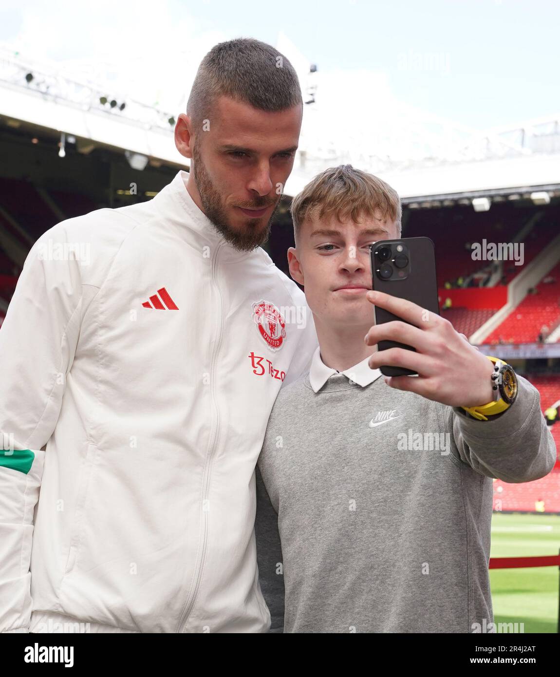 Manchester United’s David De Gea poses for a photo with Mikey Crawford ...