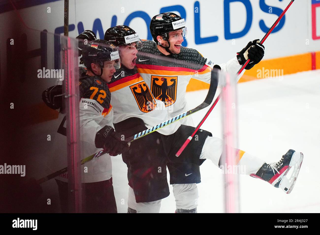 Germany's John Peterka celebrates his goal with teammates during the ...