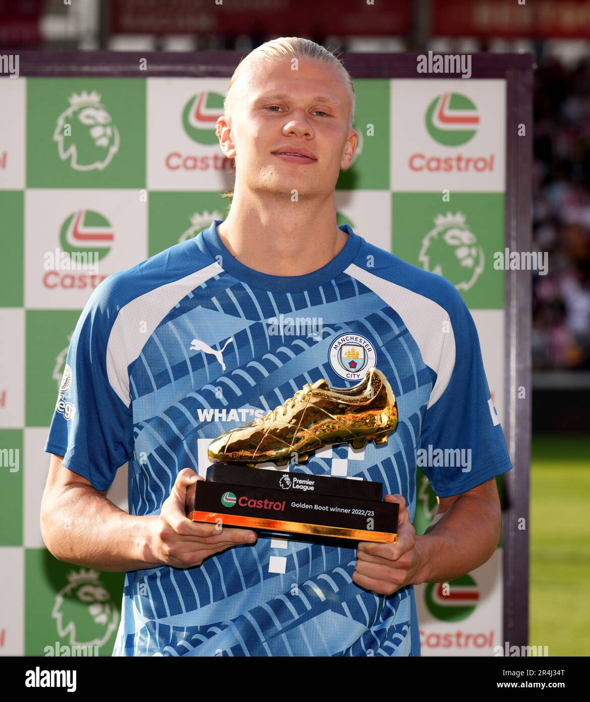 Manchester City's Erling Haaland is presented with the Castrol Golden ...