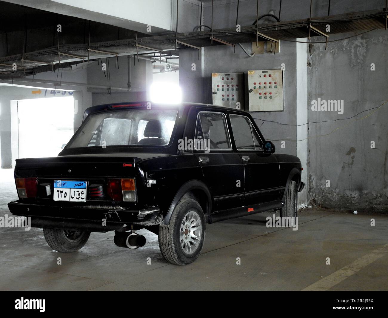 Cairo, Egypt, May 13 2023: an old vintage retro FIAT 128 NASR black car ...
