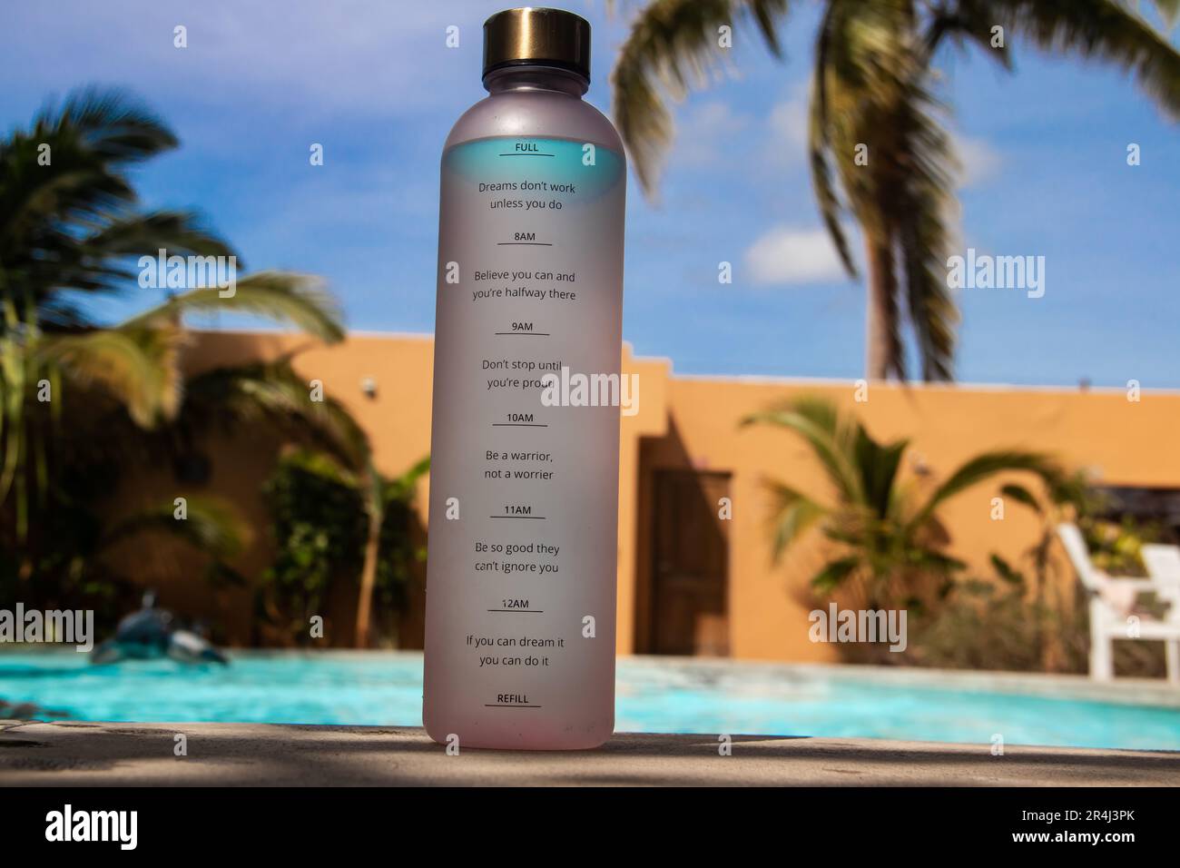 Graphic water bottle next to swimming pool, promoting healthy life by ...