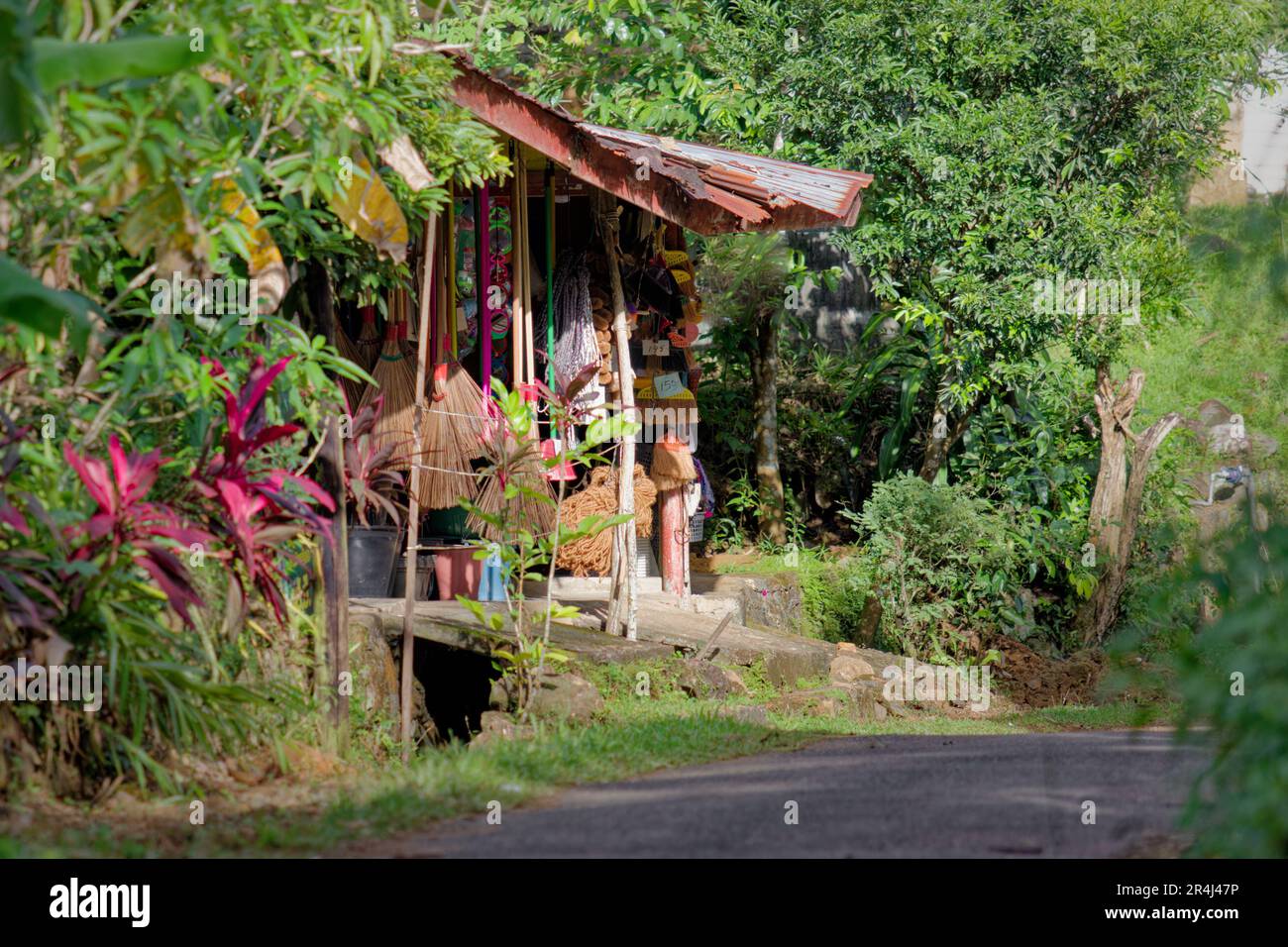 Rural shop, store front selling variety of items in a Asian village ...