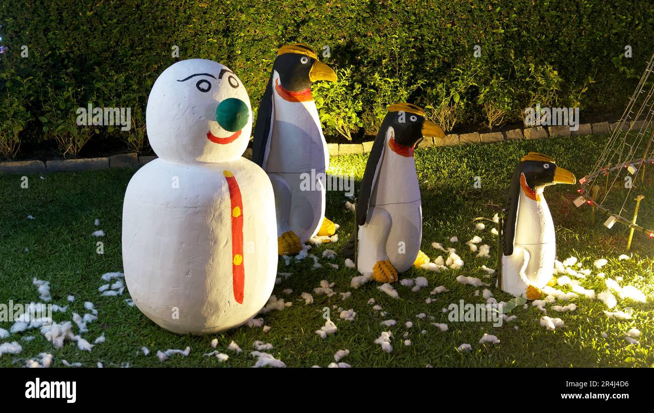 Creepy illuminated sculptures of penguins and a snowman installed on ...
