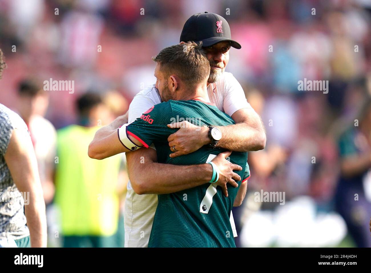 Liverpool manager Jurgen Klopp (left) hugs James Milner after the final ...
