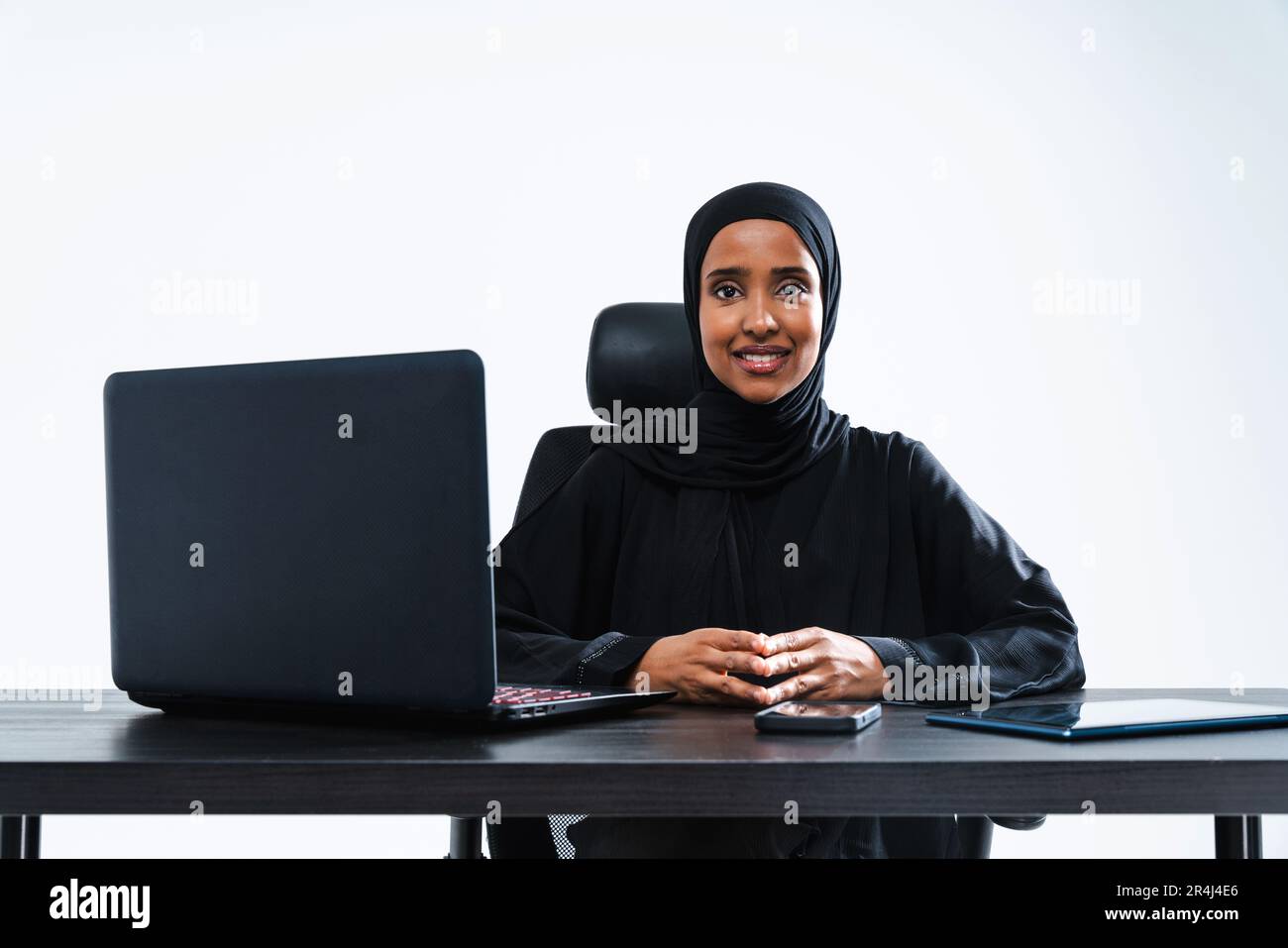 Beautiful arab middle-eastern corporate businesswoman with traditional ...