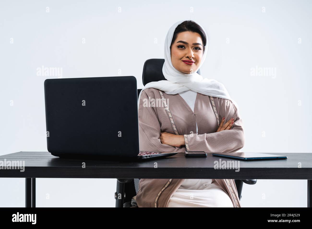 Beautiful arab middle-eastern corporate businesswoman with traditional ...