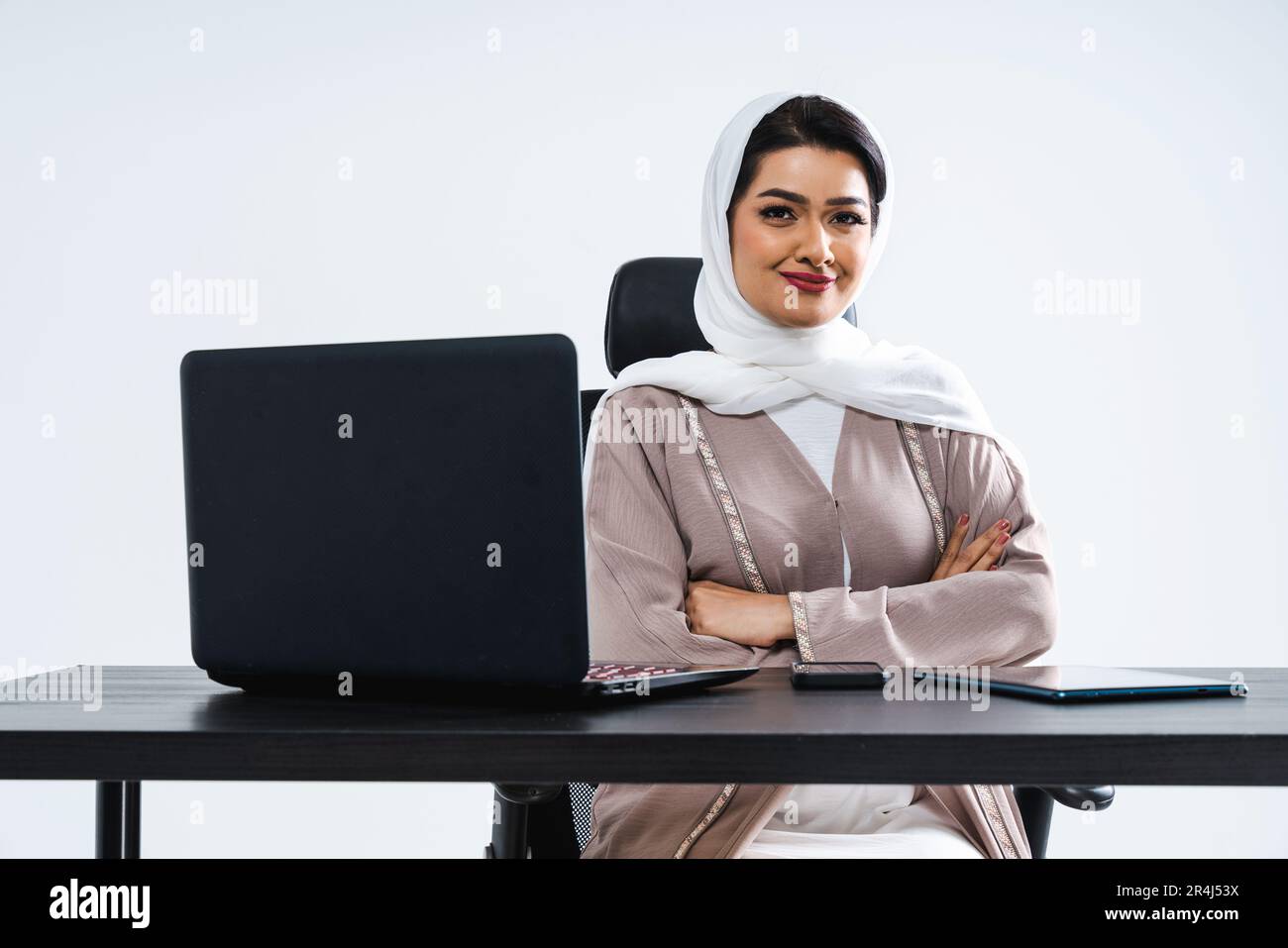 Beautiful arab middle-eastern corporate businesswoman with traditional ...