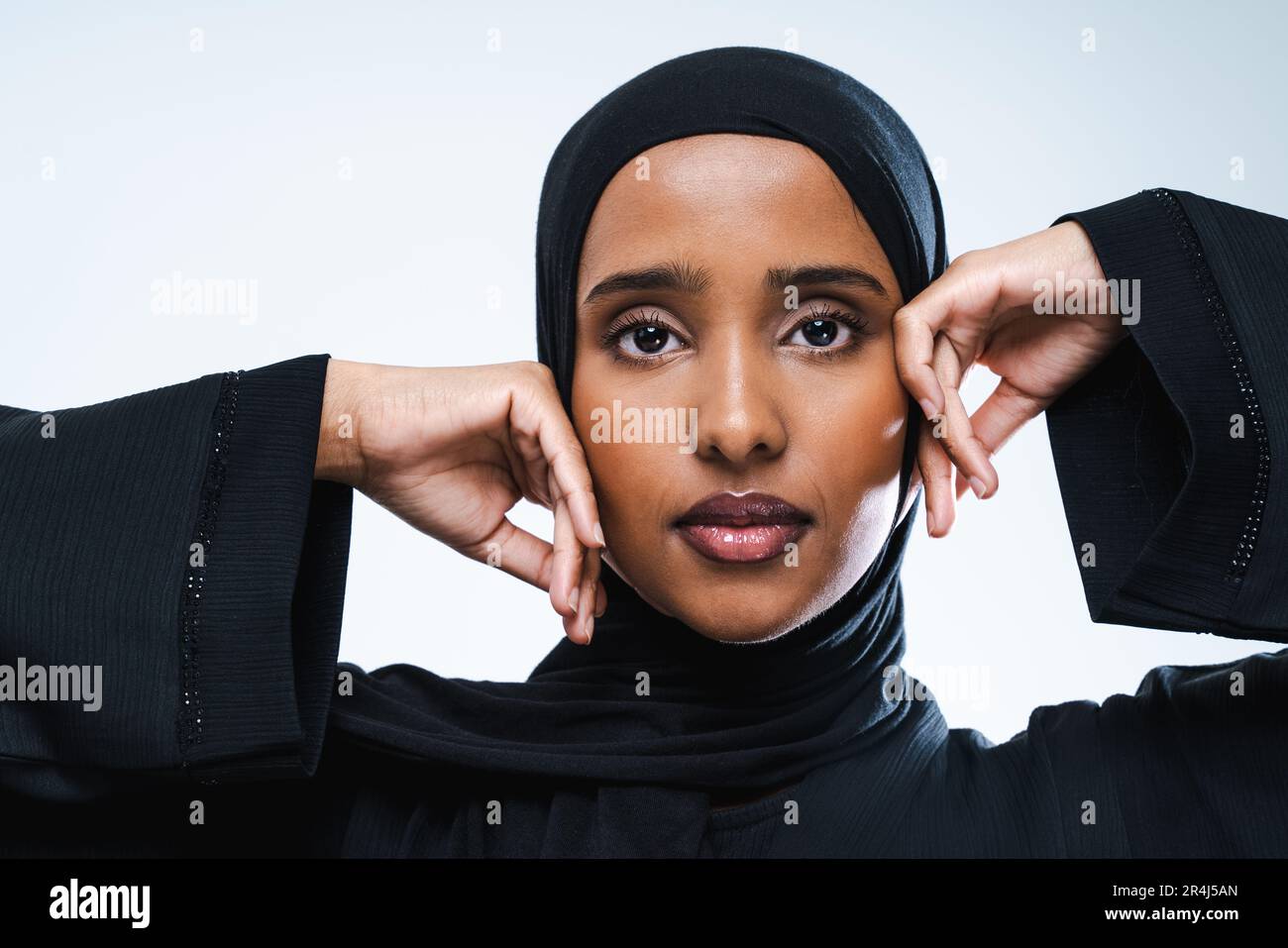 Beautiful arab middle-eastern woman with traditional abaya dress in studio - Arabic muslim adult ...