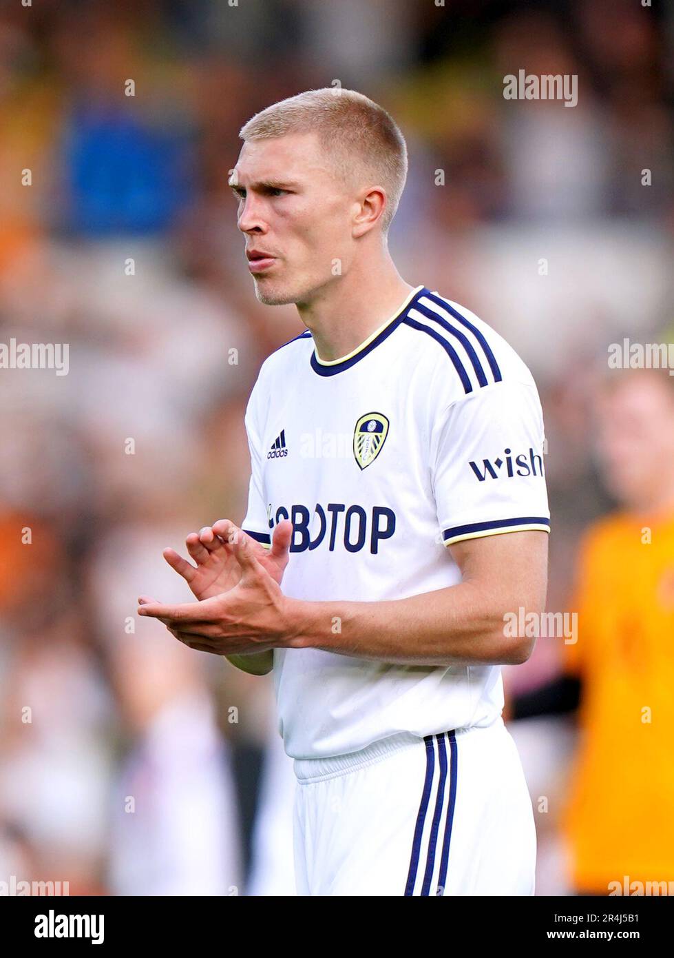 Leeds United's Rasmus Kristensen acknowledges the fans after being ...