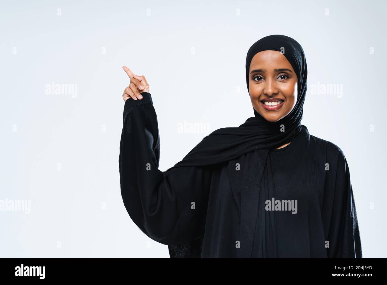 Beautiful arab middle-eastern woman with traditional abaya dress in ...