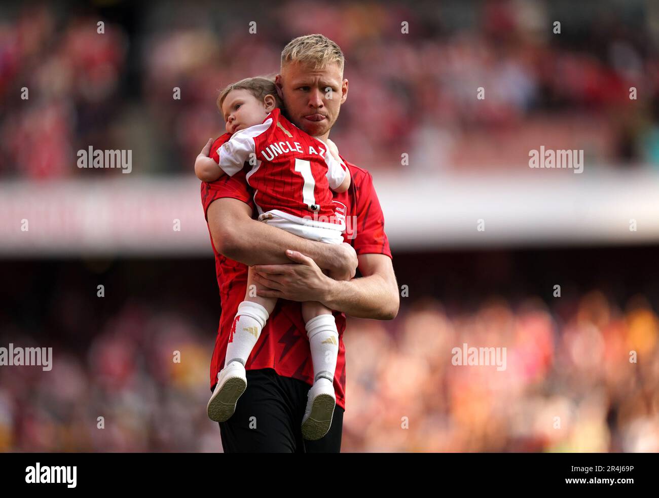 Arsenal goalkeeper Aaron Ramsdale and family on a lap of honour ...
