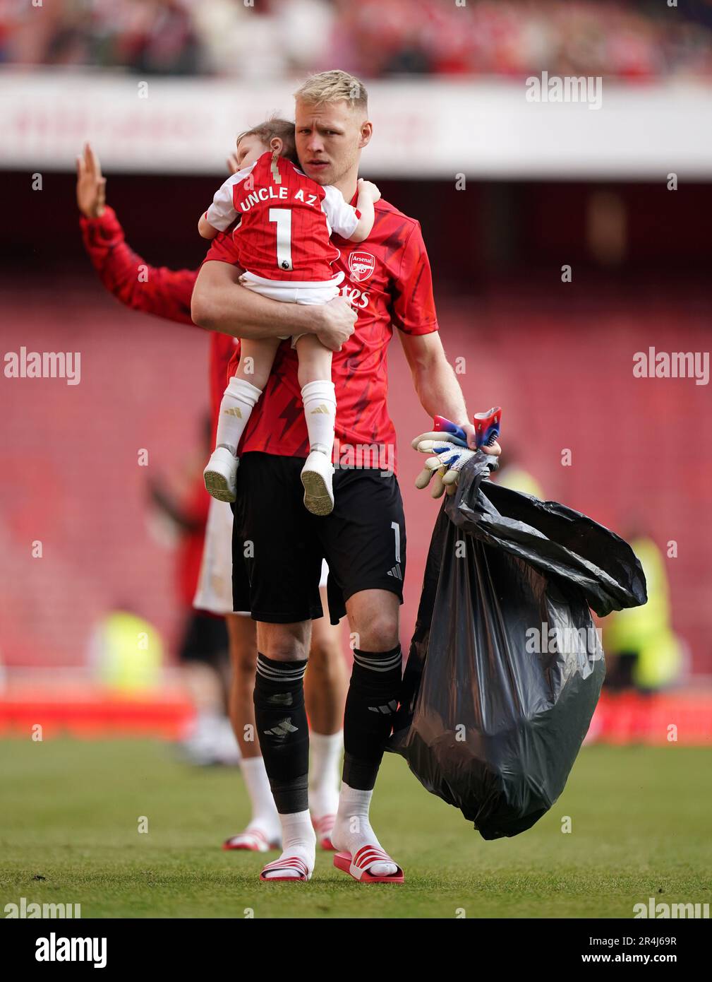 Arsenal goalkeeper Aaron Ramsdale and family on a lap of honour ...
