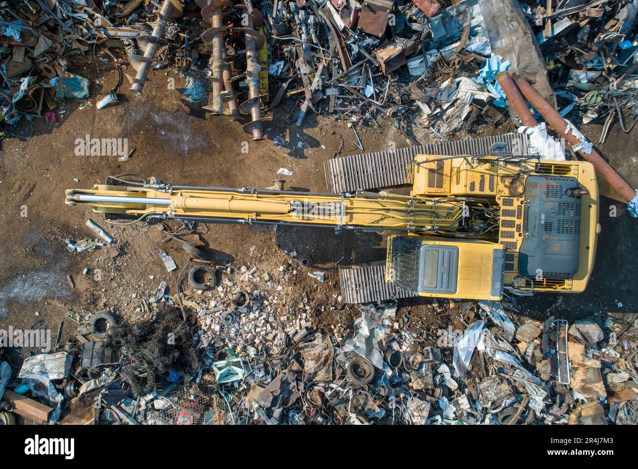 Excavator working on junk dump.Garbage the city. Soil pollution Stock ...