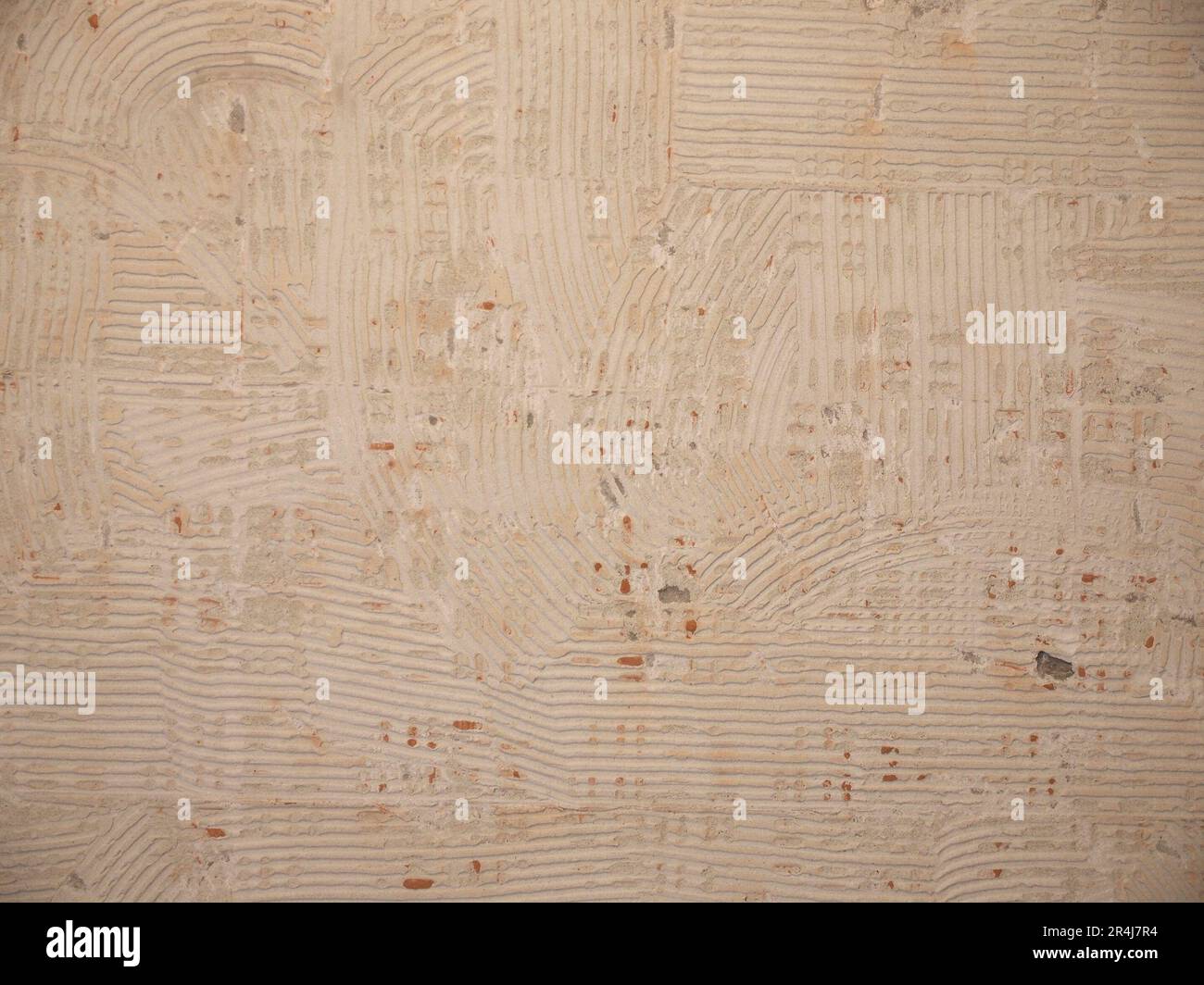 tiles glue marks on a wall plaster Stock Photo - Alamy