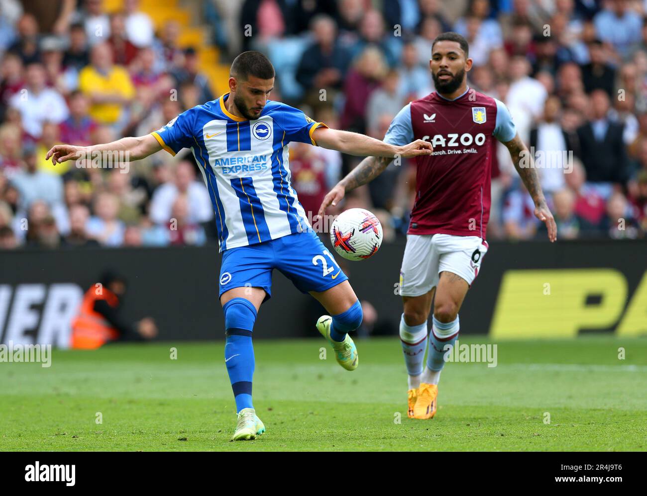 Brighton and Hove Albion's Deniz Undav (left) scores their side's first ...