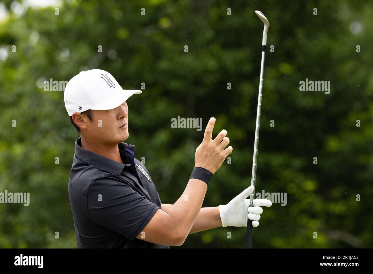 Danny Lee of Iron Heads GC hits his shot on the driving range during ...