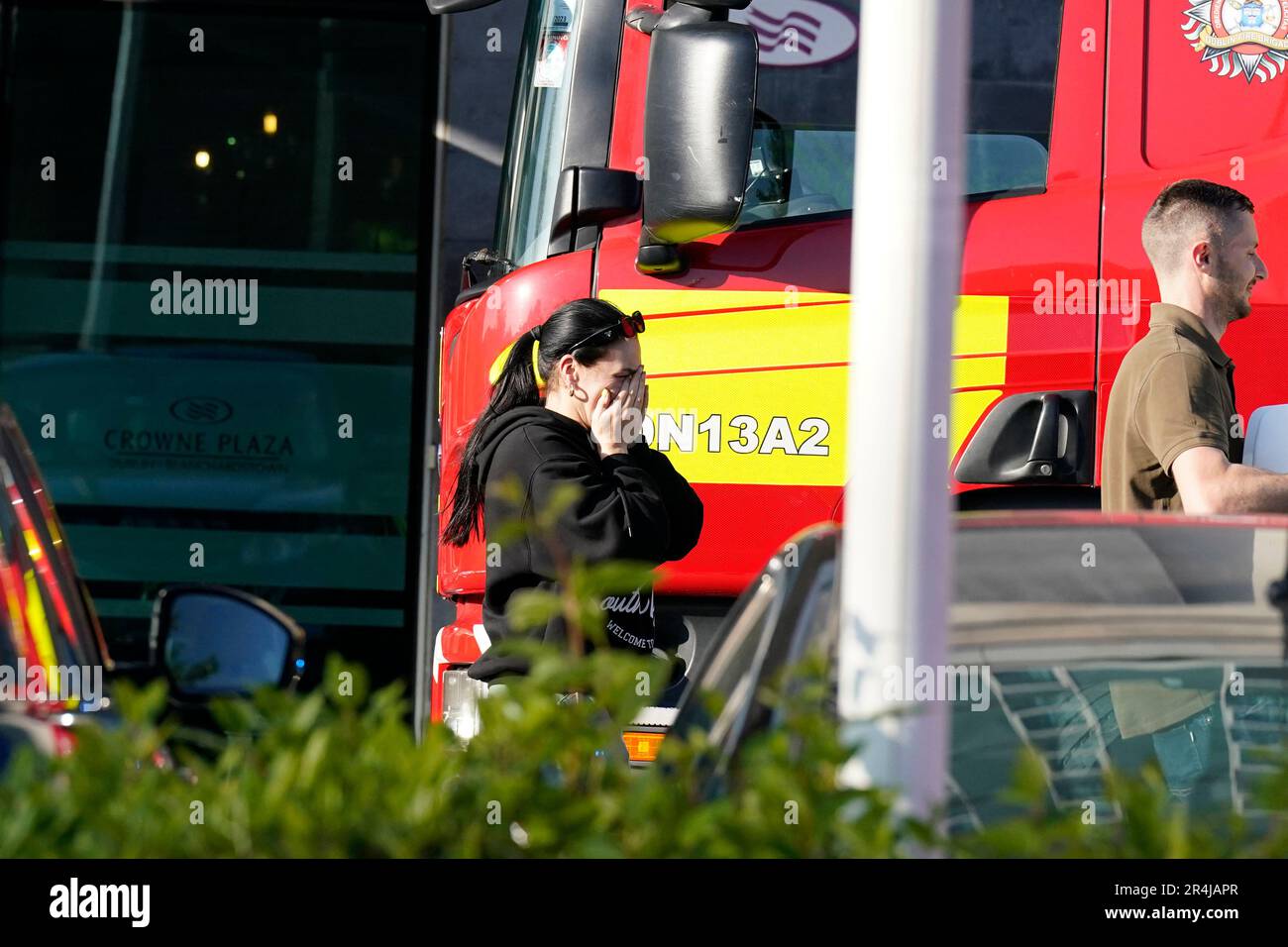 A person believed to be a resident at the scene of a fire in the Falcon ...