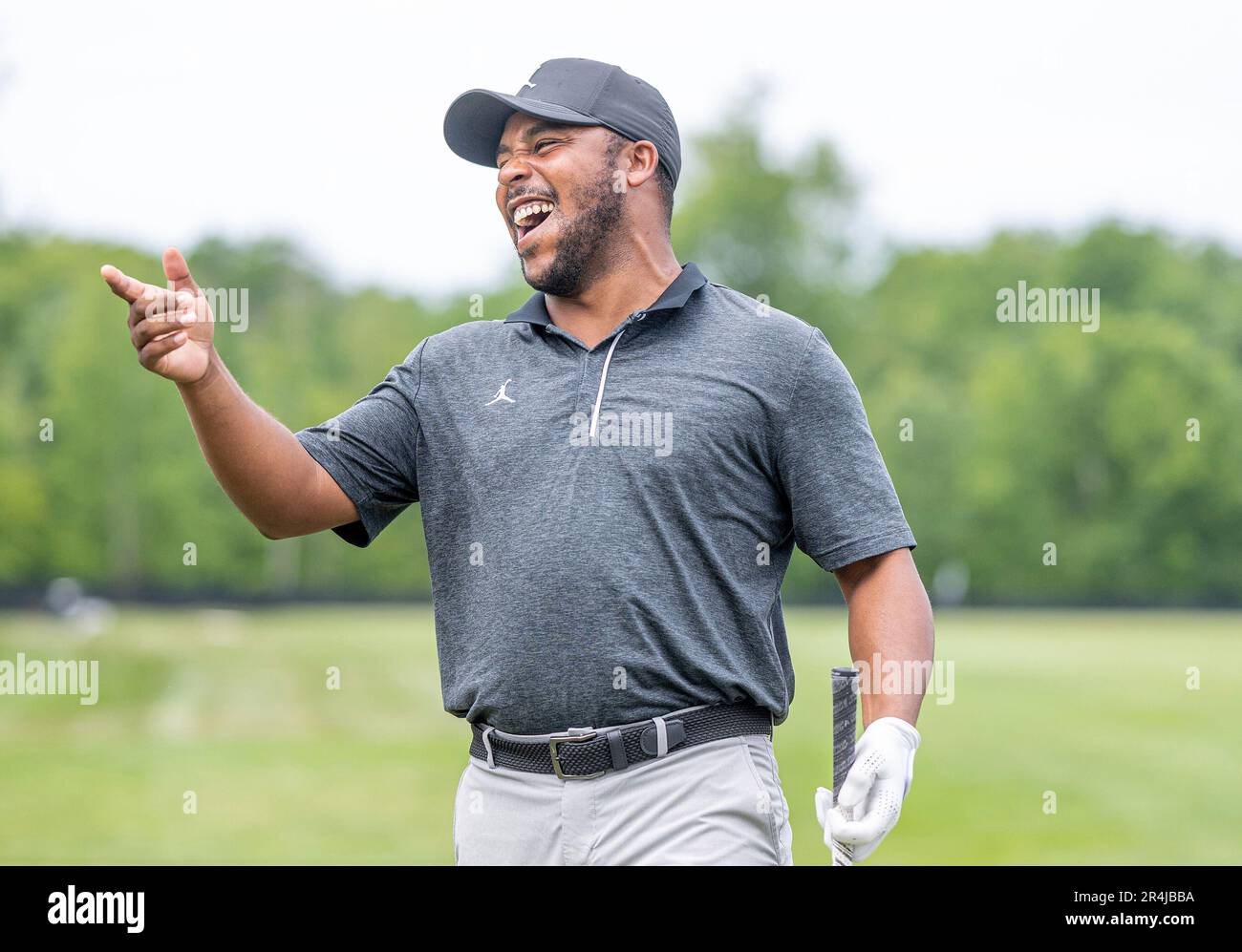 Harold Varner III of RangeGoats GC laughs on the driving range before ...
