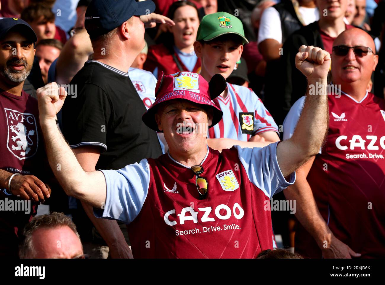 An Aston Villa fan celebrates at the end of the Premier League match at ...