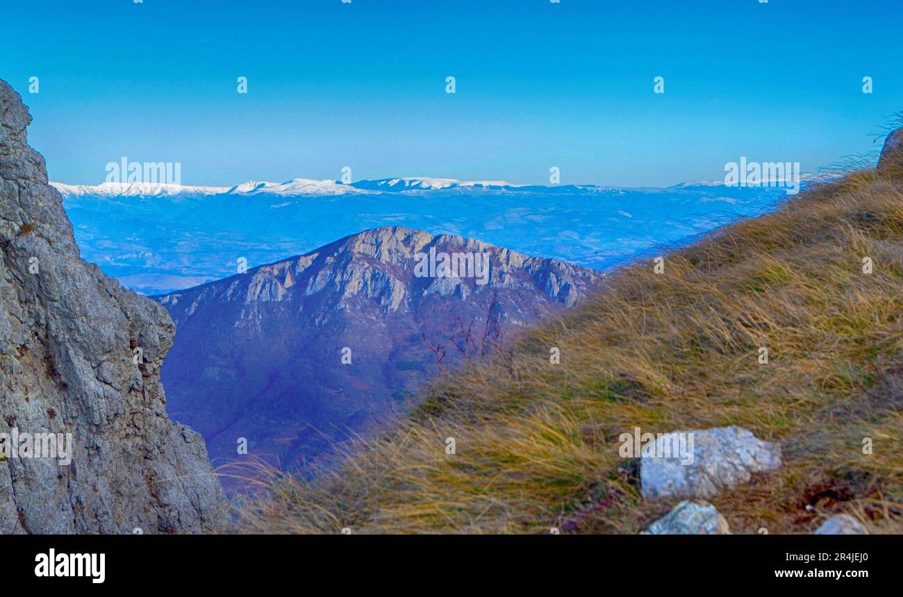 The view from Suva Planina to the snowy peaks of Stara Planina Stock ...
