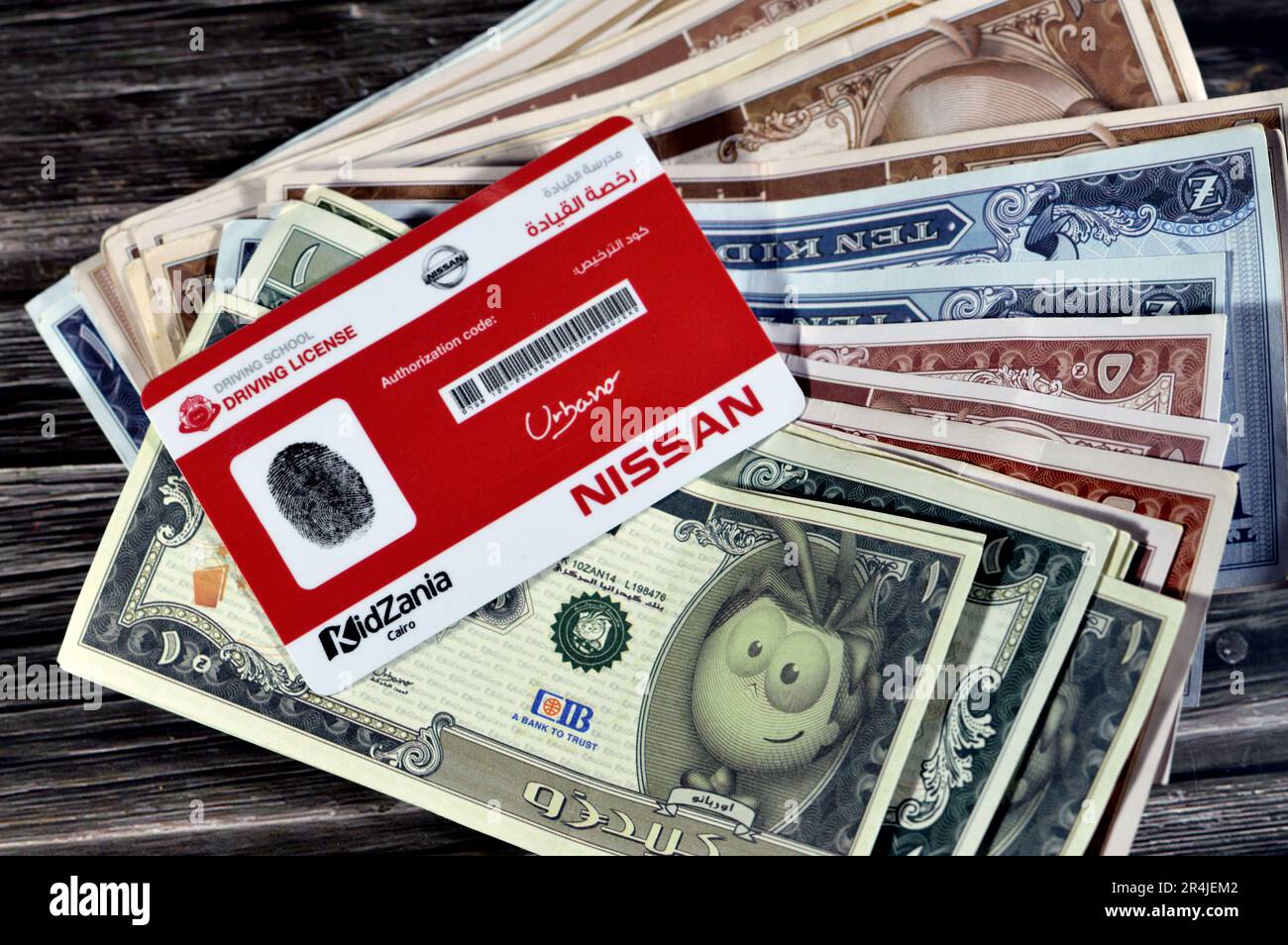 Cairo, Egypt, May 26 2023: KidZos money, Driving license of KidZania, a ...