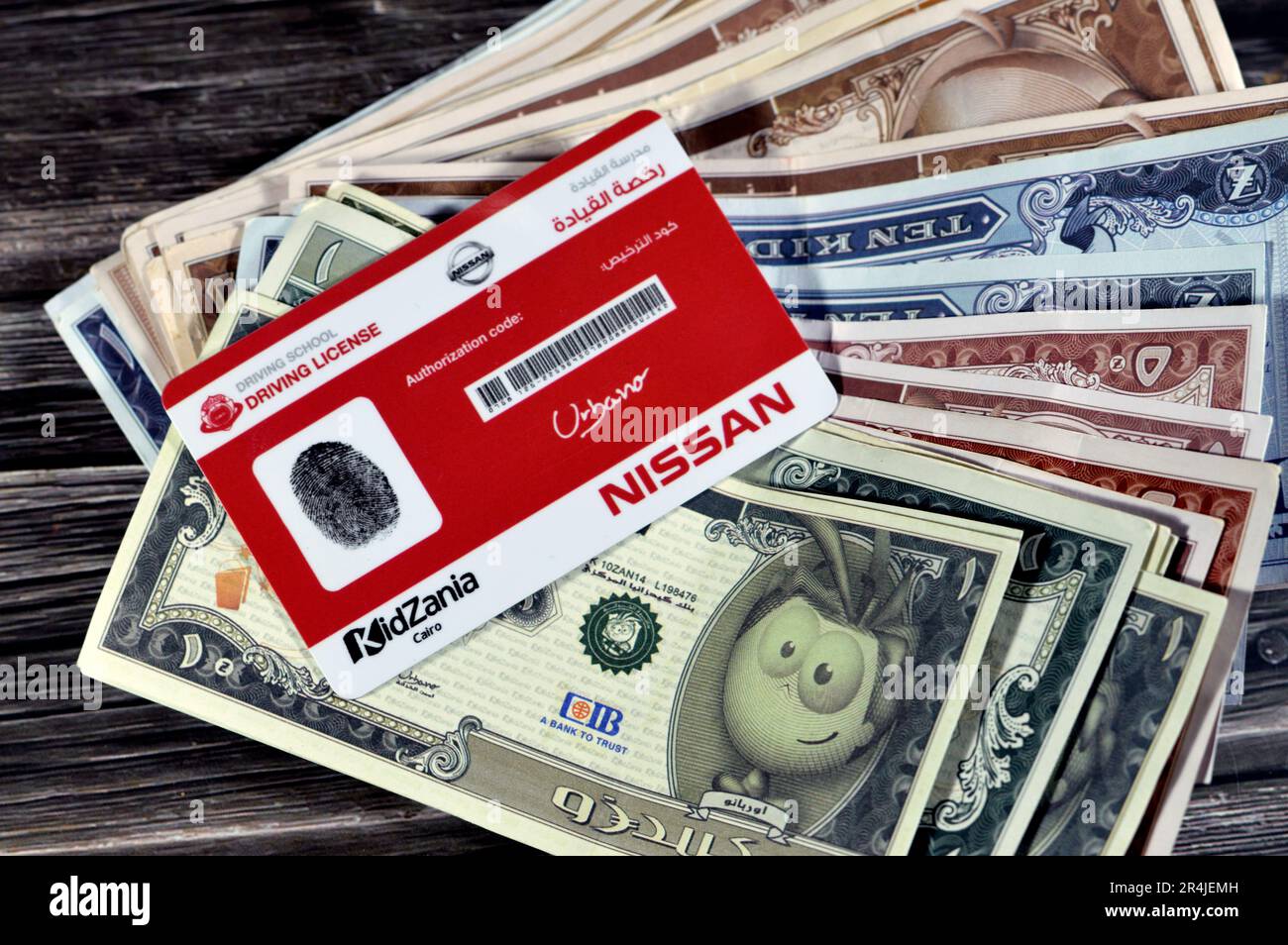Cairo, Egypt, May 26 2023: KidZos money, Driving license of KidZania, a ...